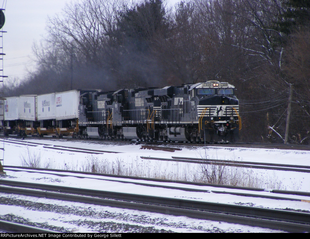 NS 7556 heads east.